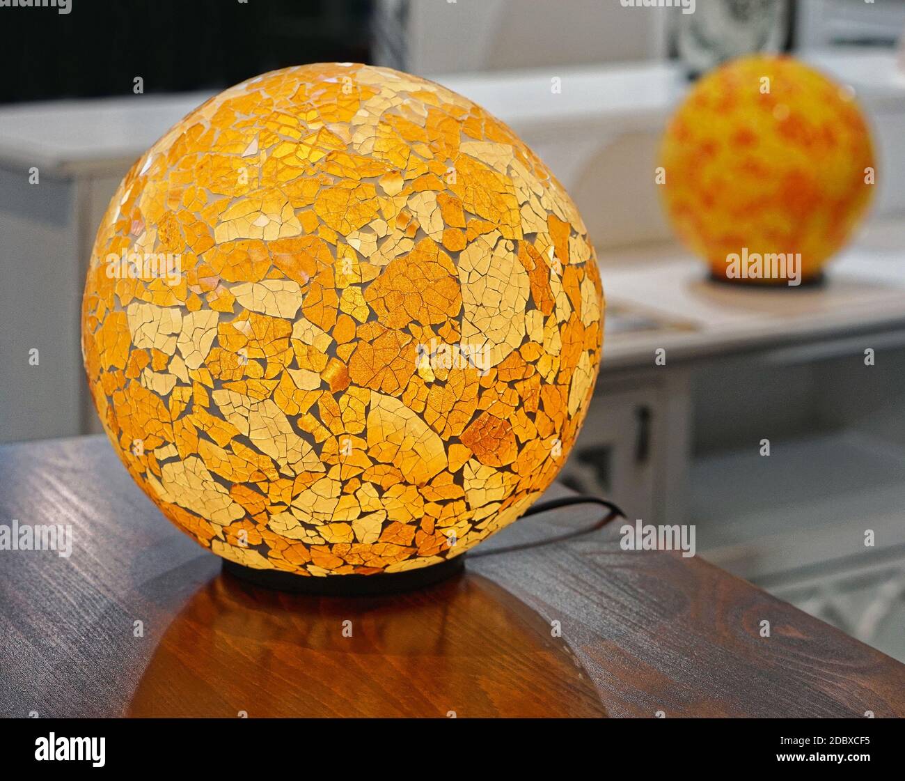 Modern table lamp with glass sphere Stock Photo - Alamy