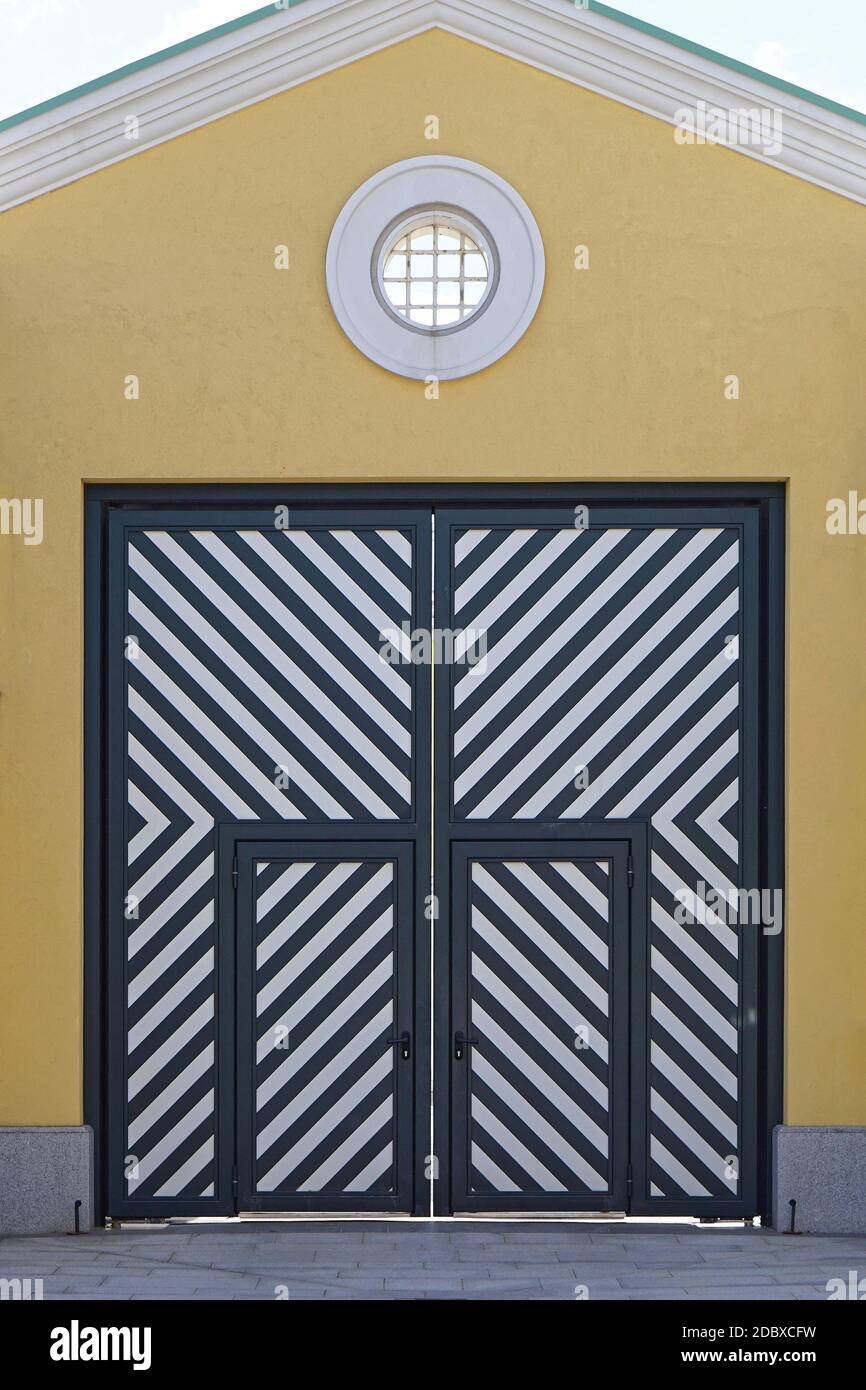 Big double door with diagonal stripe lines Stock Photo - Alamy