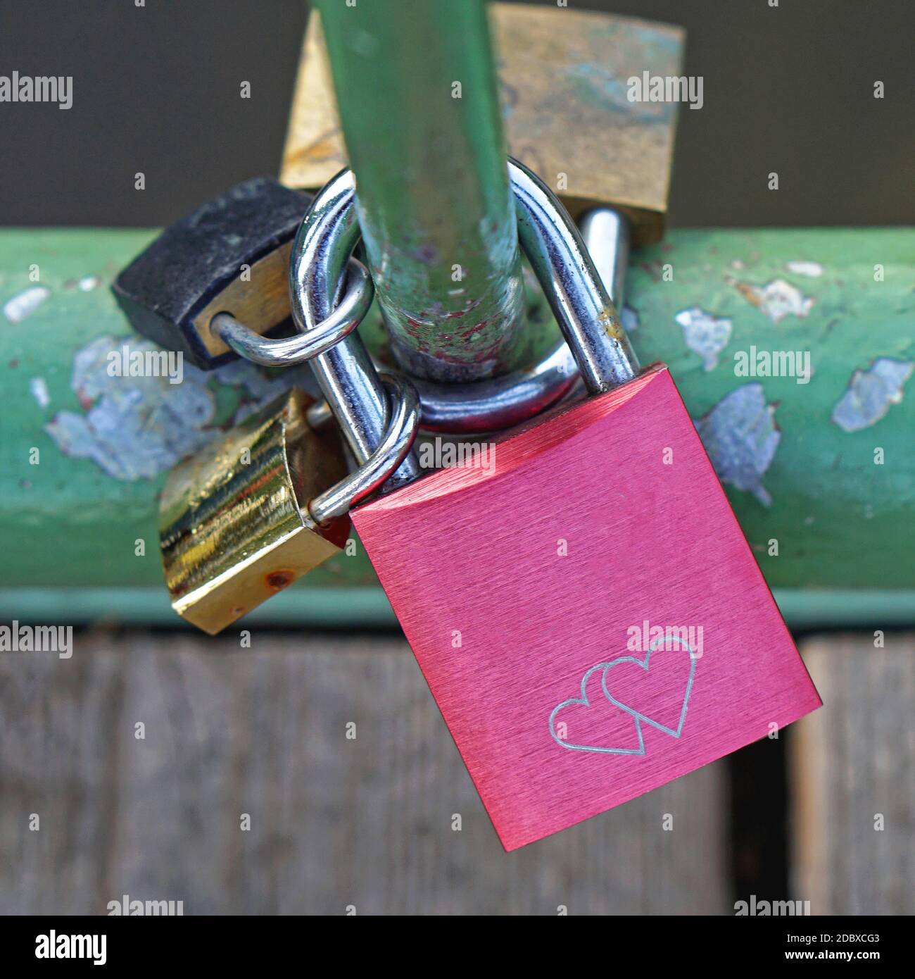 Love locks attached at bridge fence Stock Photo - Alamy