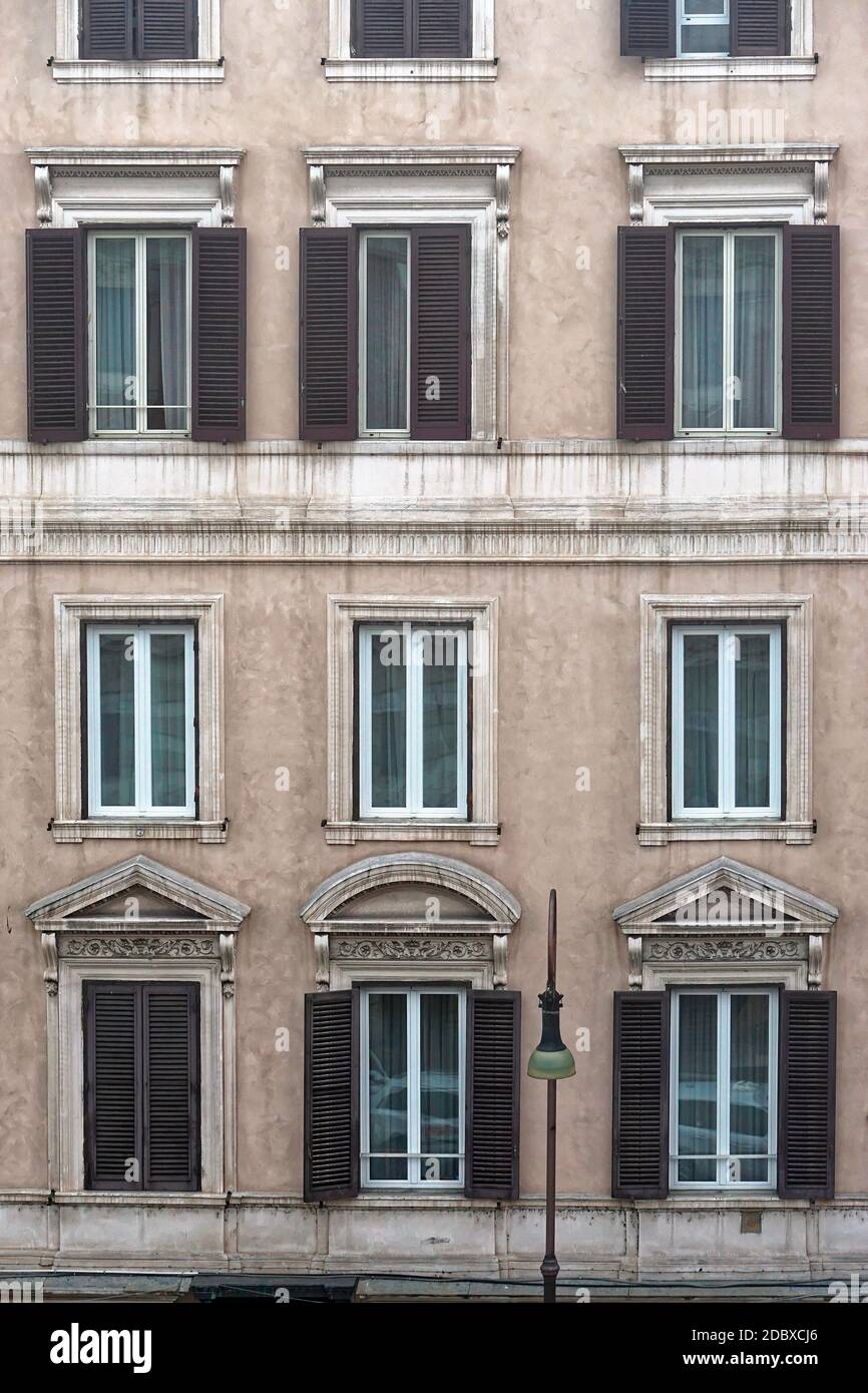 Windows at classic style building in Rome Stock Photo - Alamy