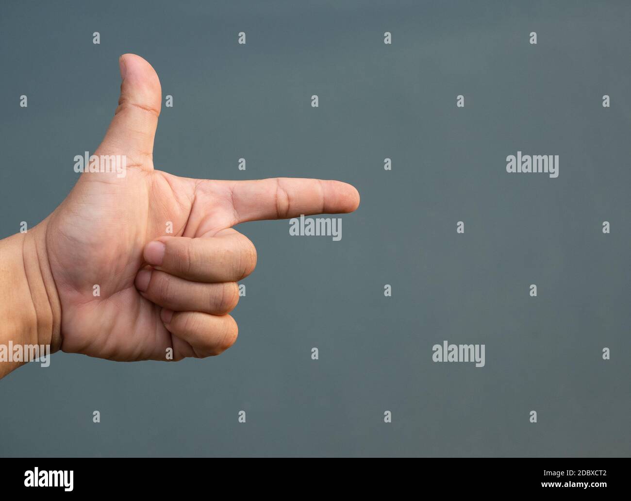 Human hand mand forefinger symbol on blue background. For advertising ...