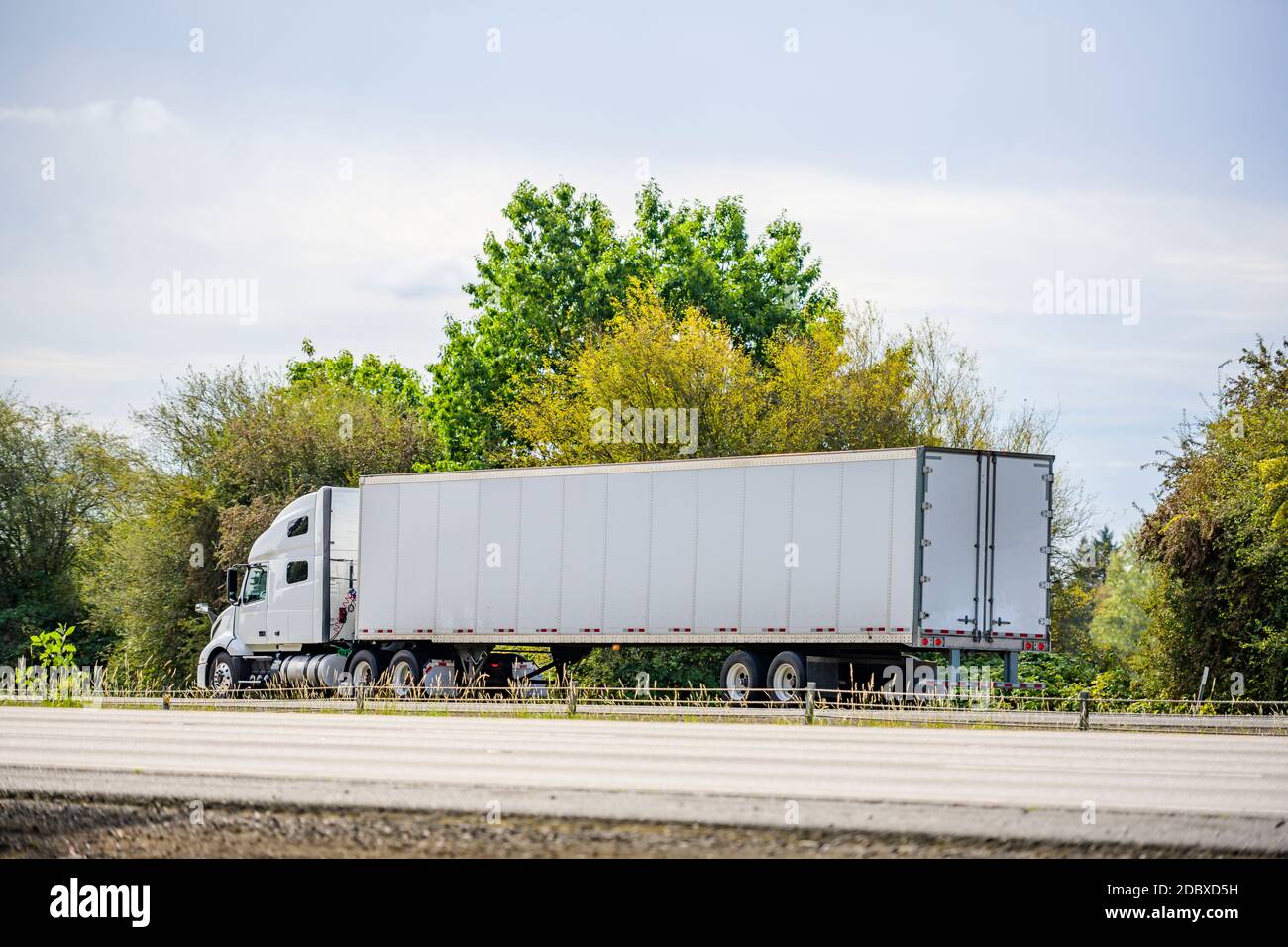 Big rig white long haul industrial semi truck tractor with sleeper cab ...
