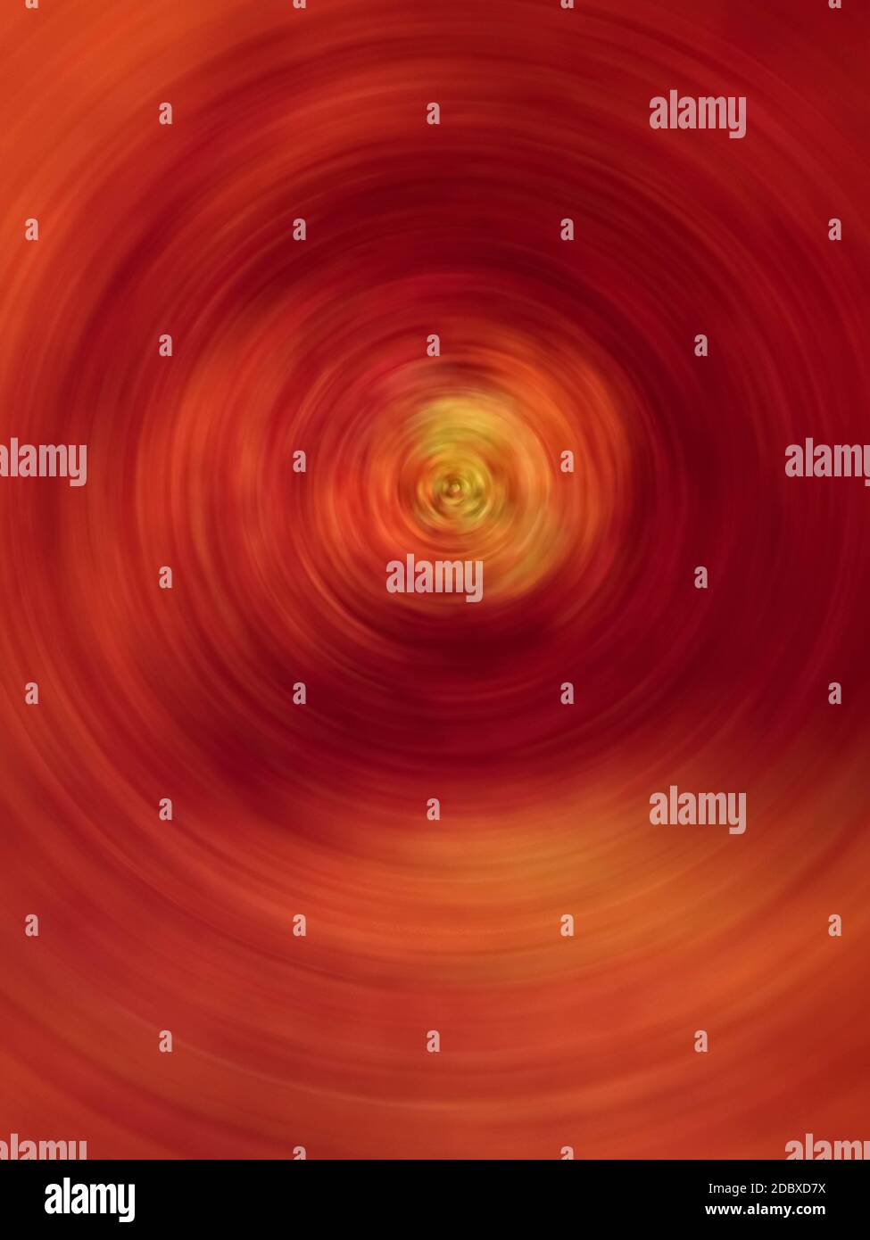 Bright red abstract wallpaper background shows concentric circles with ...