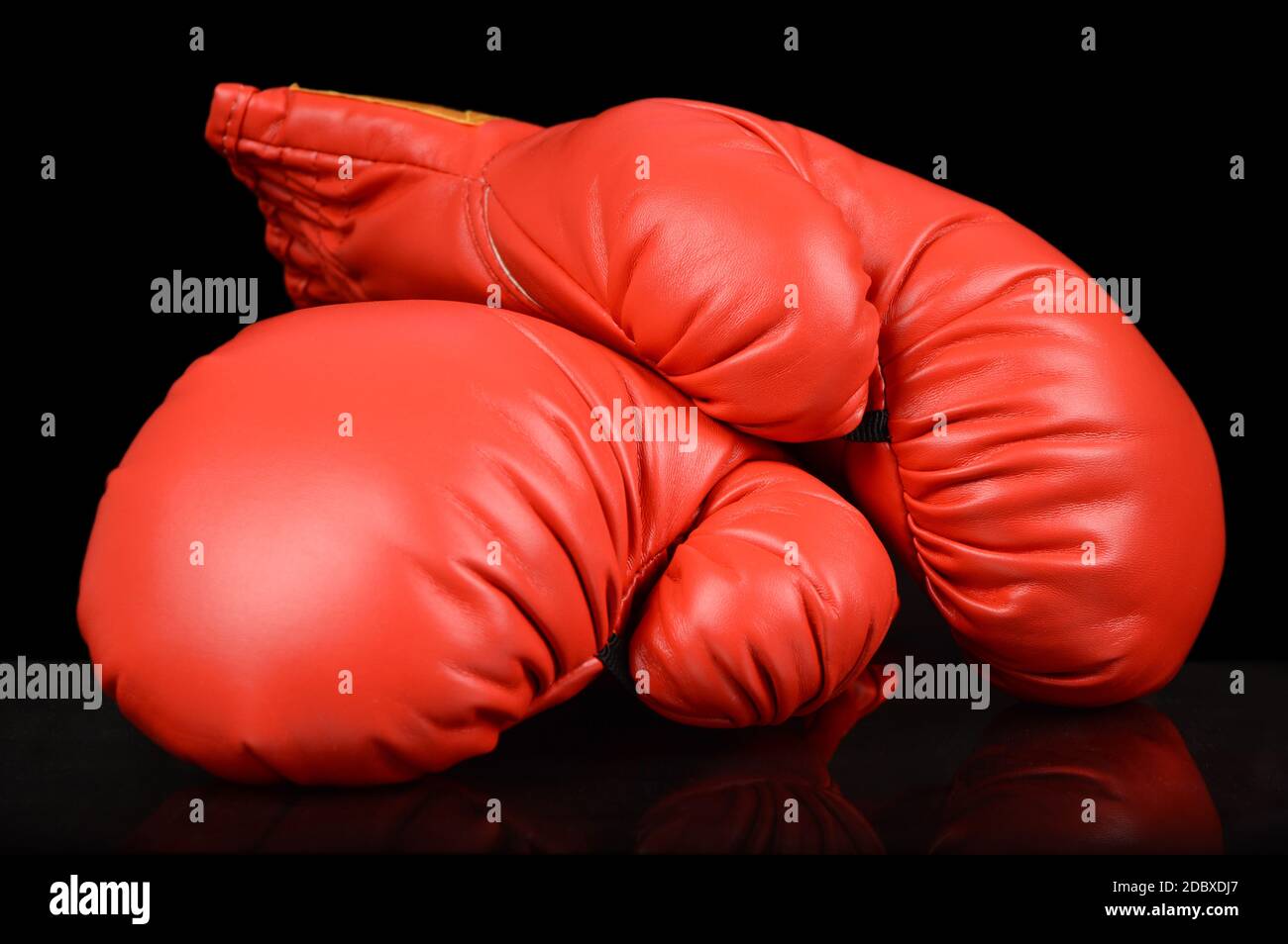 A pair of red boxing gloves to highlight the competitive sport Stock ...