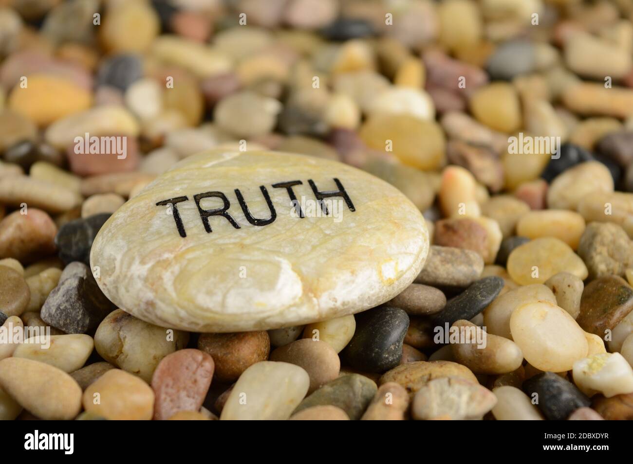 A stone with the word Truth engraved on it for affirmation purposes ...