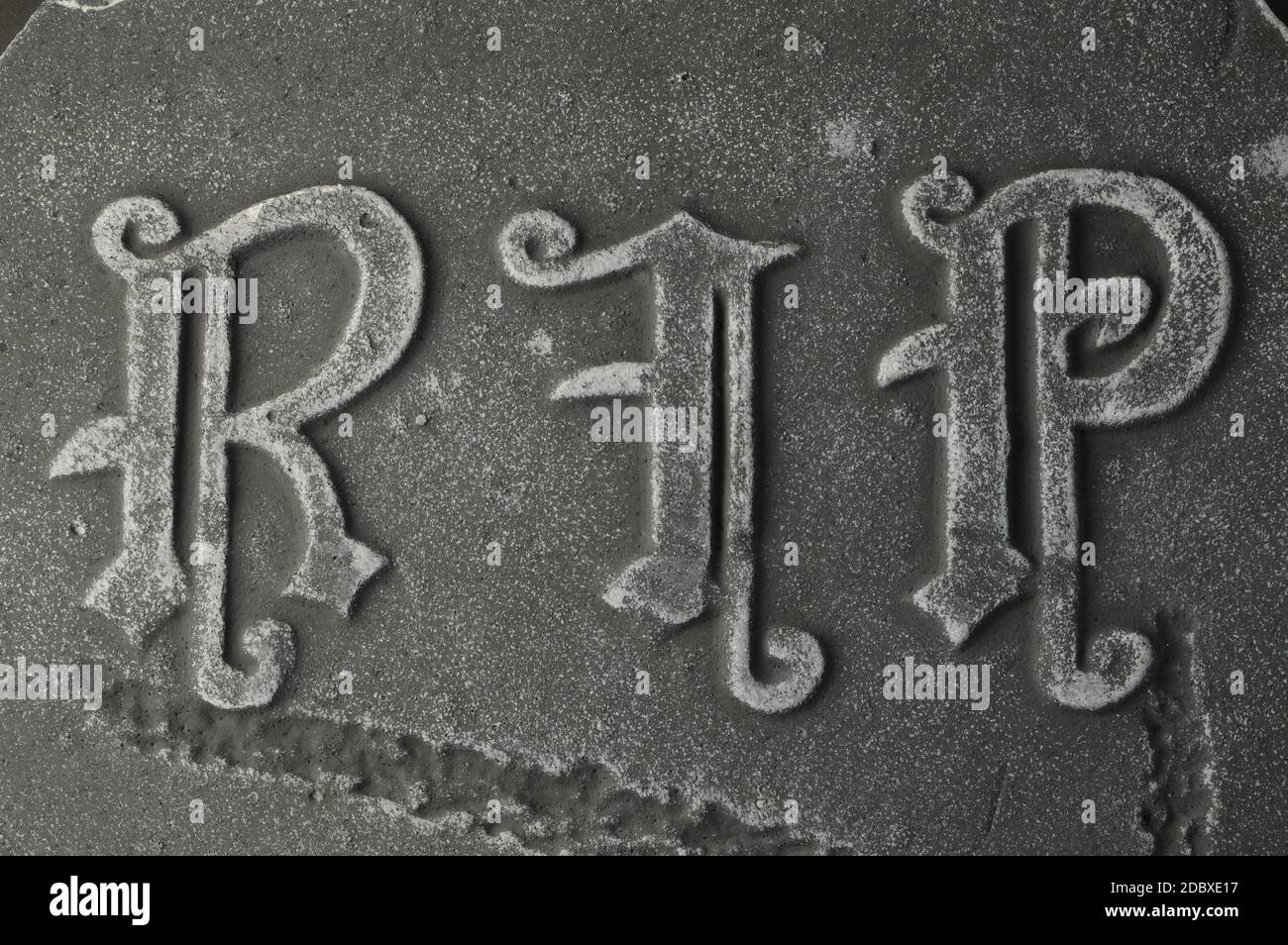 Closeup of a gravestone with the words RIP rest in peace Stock Photo ...