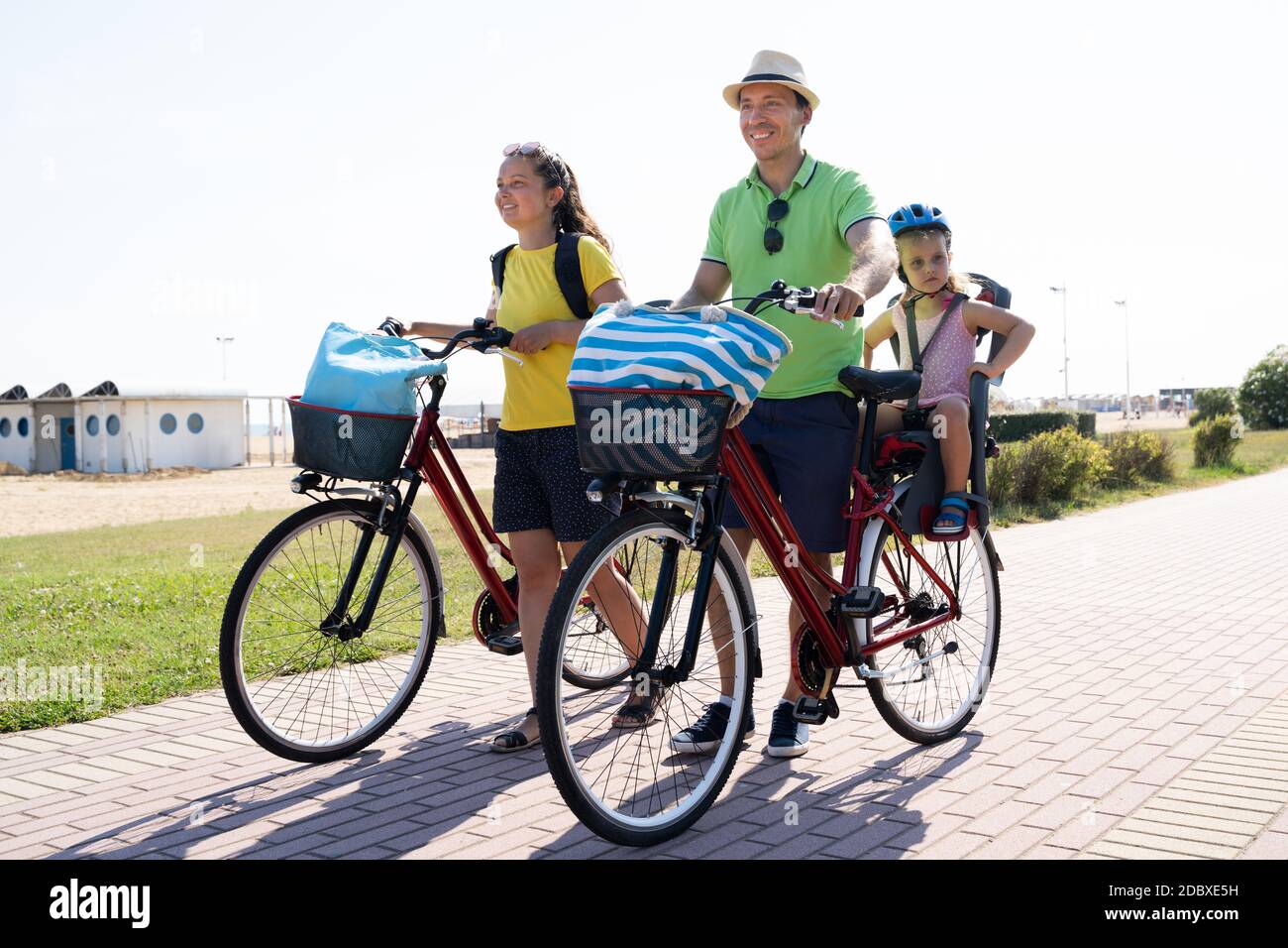 Family Riding Bicycle Outside. Happy People Doing Sports Stock Photo ...