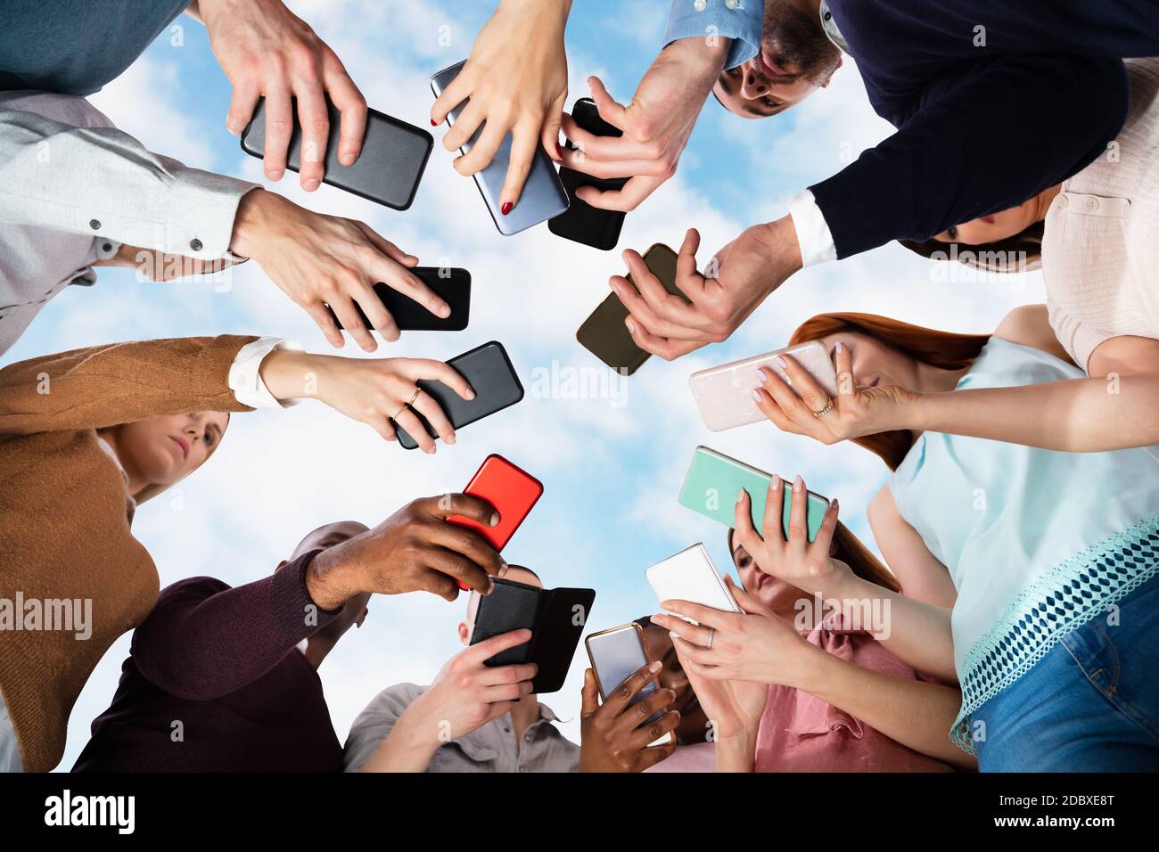 Large group of people and cell phones hi-res stock photography and ...