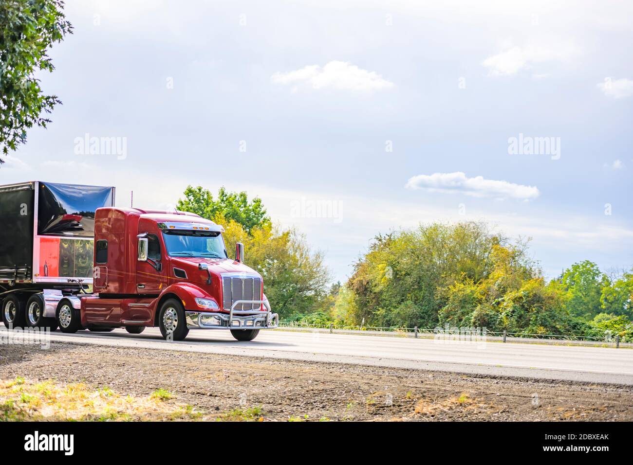 Big rig red long haul industrial semi truck tractor with sleeper cab ...