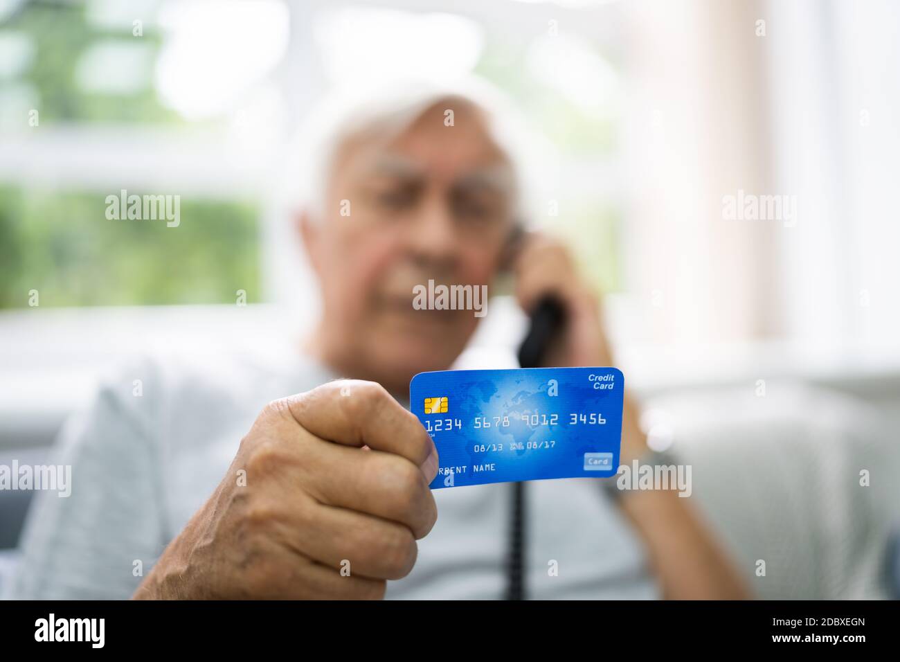 Elder Scam Call And Senior Pension Finance Fraud Stock Photo - Alamy