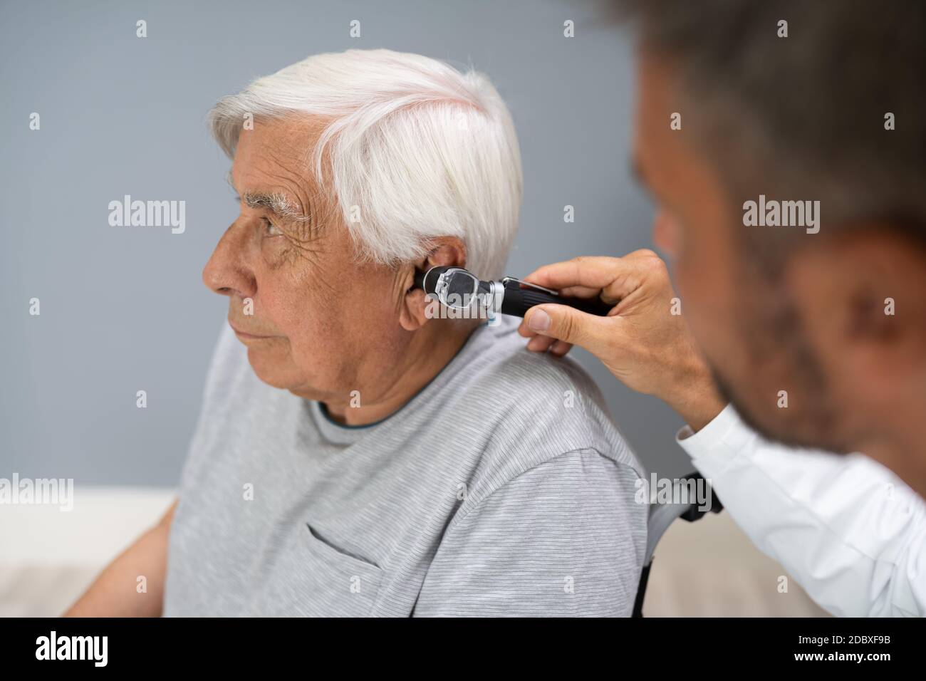 Otolaryngology Check. Doctor Checking Ear Using Otoscope Stock Photo ...