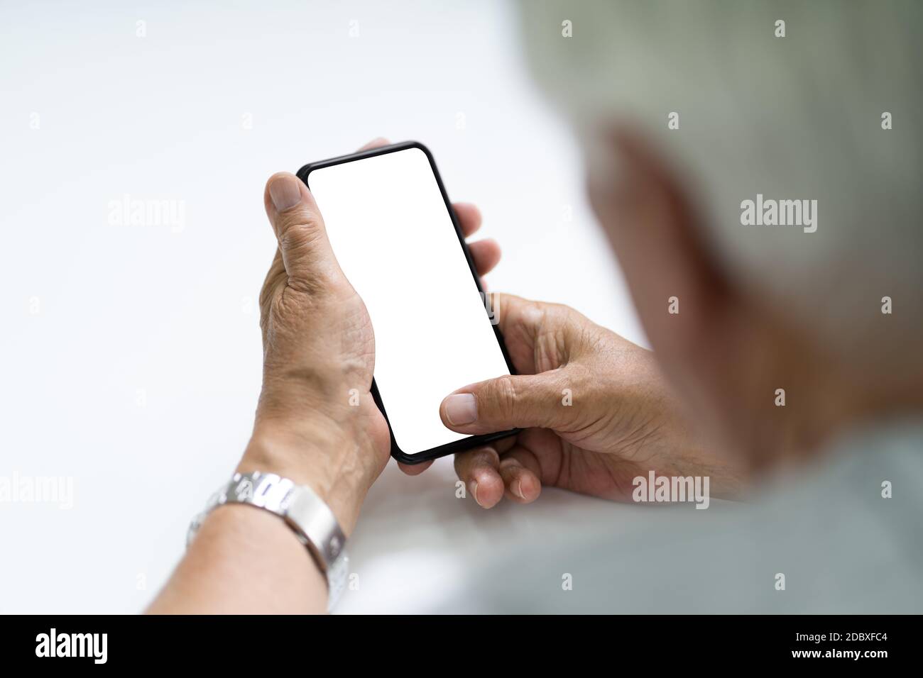 Elderly Senior Hand Using Cell Phone Or Smartphone Stock Photo - Alamy