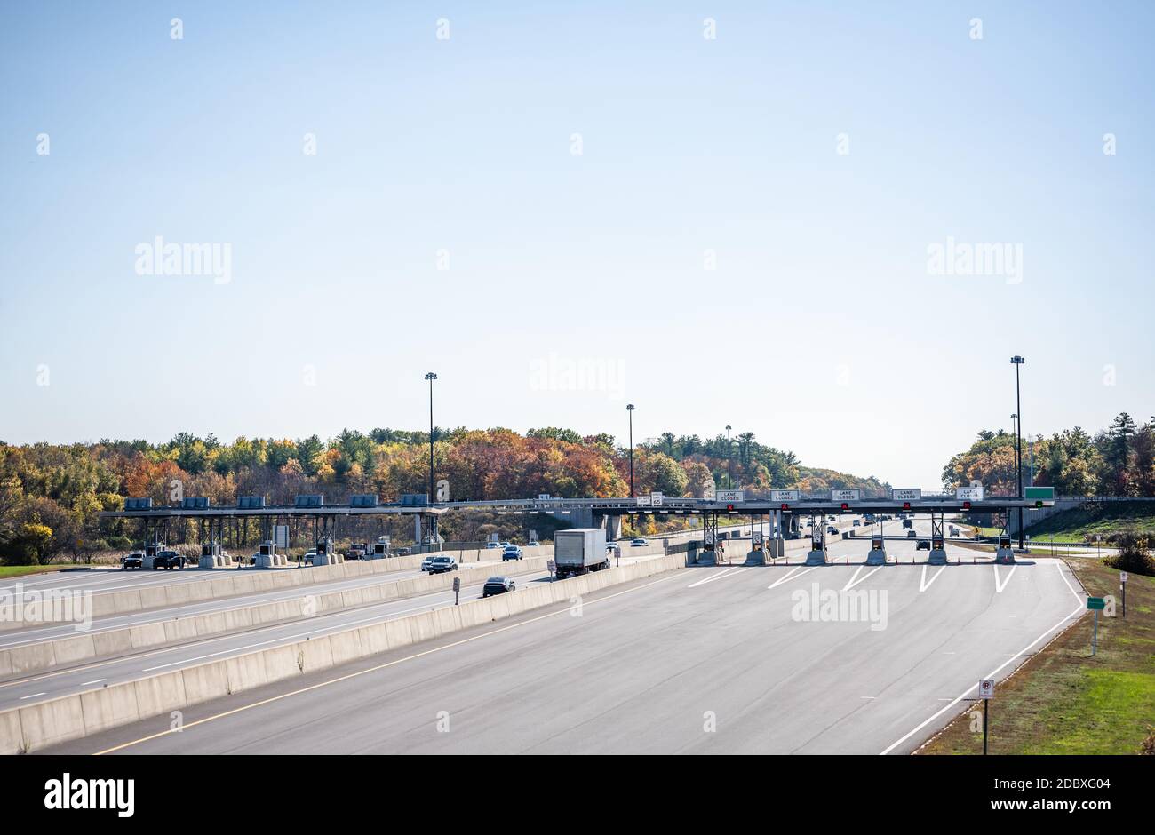 Wide divided turnpike highway with toll station with multi-line payment ...