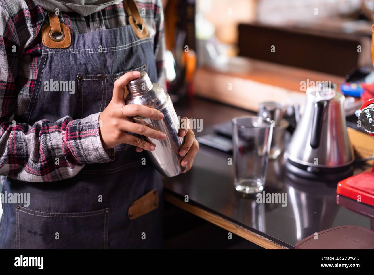 barista make a mixed drink for a customer in a cafe Stock Photo - Alamy