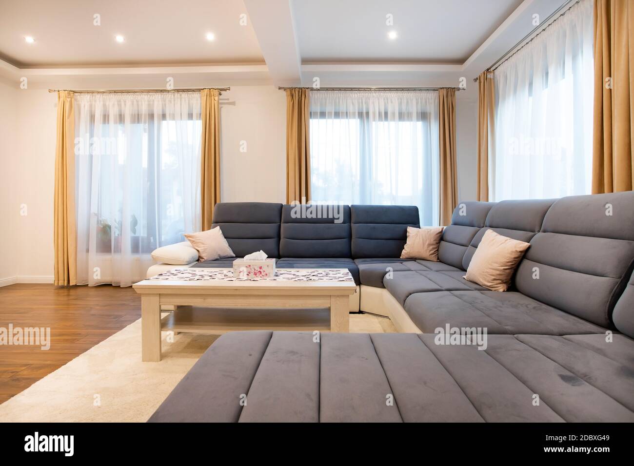 Modern living room interior - wide angle photo Stock Photo - Alamy