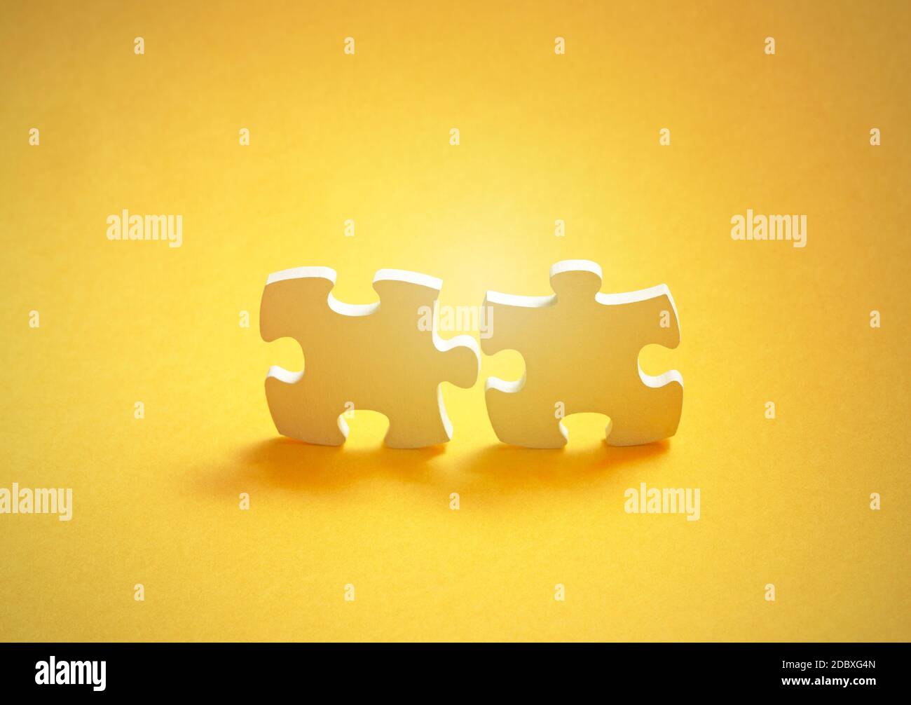 Two jigsaw puzzle pieces fit hi-res stock photography and images - Alamy