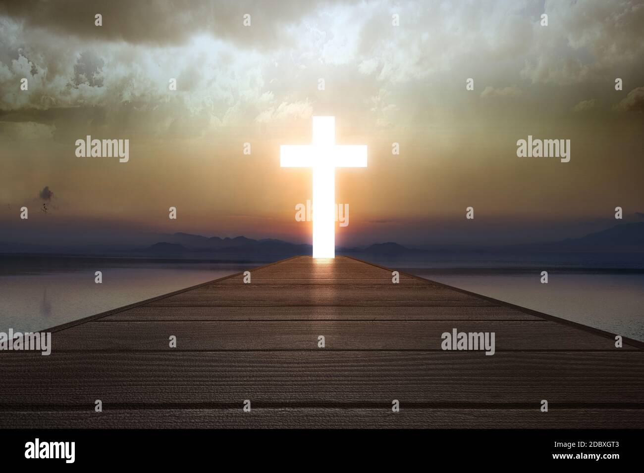 Christian cross at the end of the wooden dock with sunlight background ...