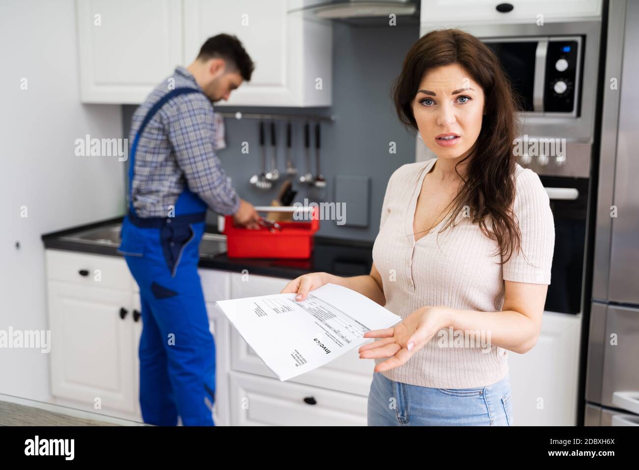 Customer Woman With Expensive Repairs Invoice At Home Stock Photo - Alamy