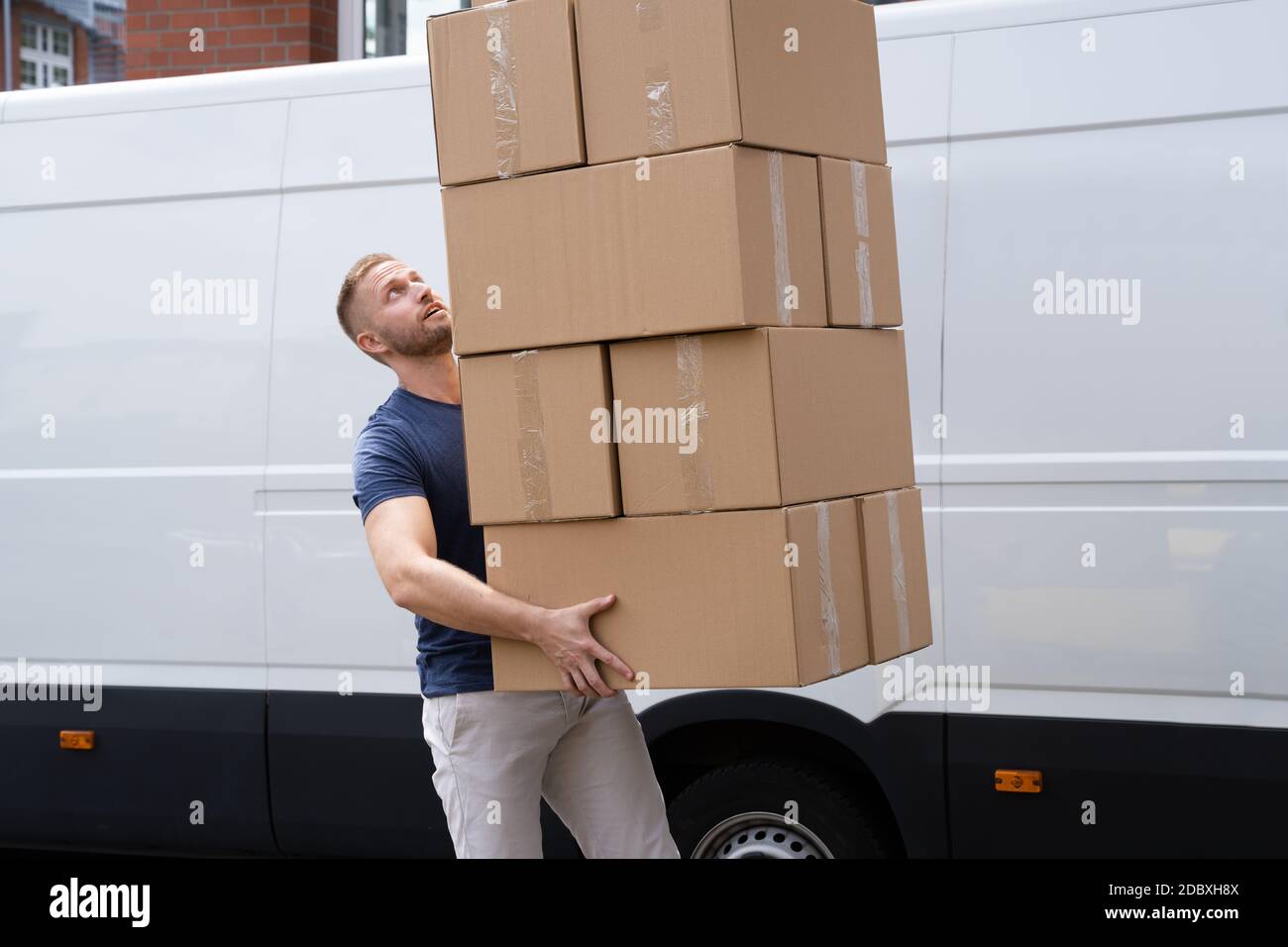 Carrying heavy furniture hi-res stock photography and images - Alamy
