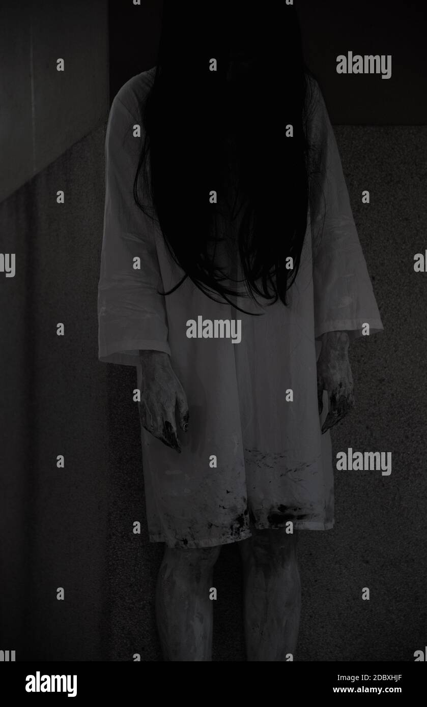 Horror woman ghost creepy stand in the house, halloween day concept ...