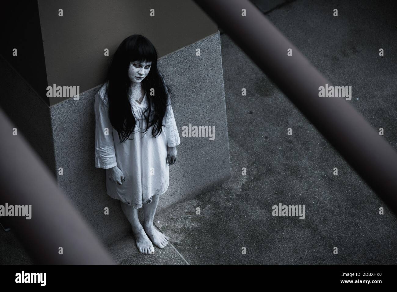 Woman ghost horror standing under building house her looking up ...