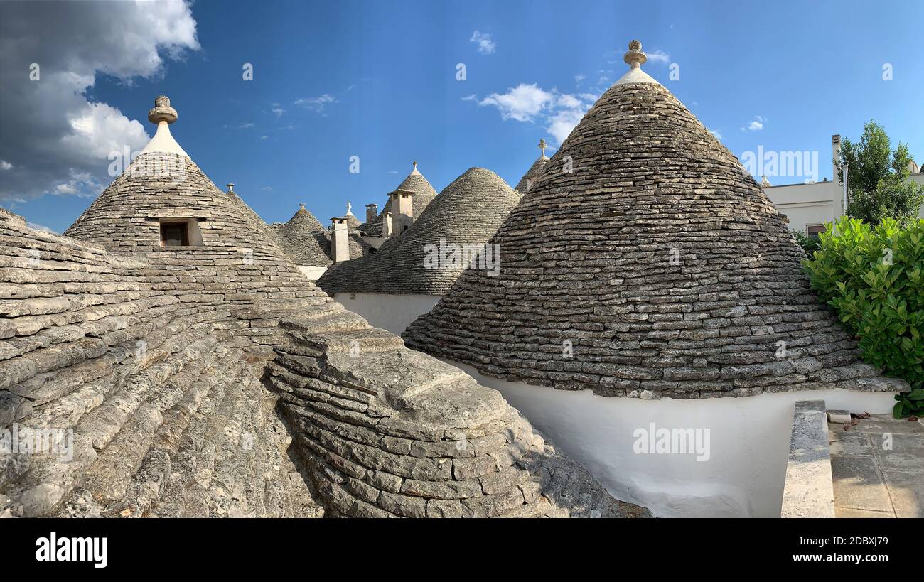 The roofs of trulli at Alberobello, Apulia, Italy. Alberobello is a ...