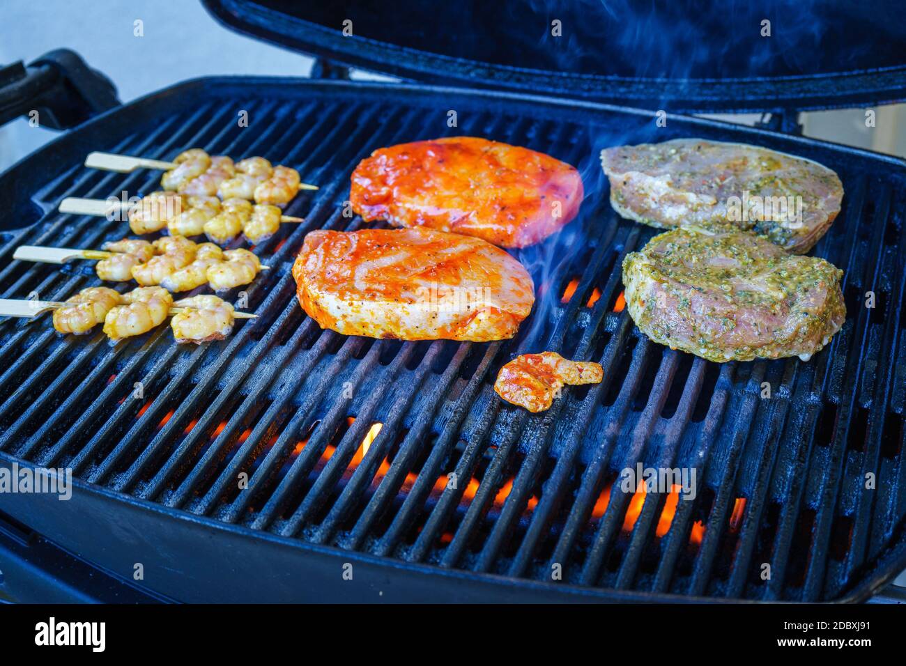Steak and Fish on a Gas Grill Stock Photo - Alamy