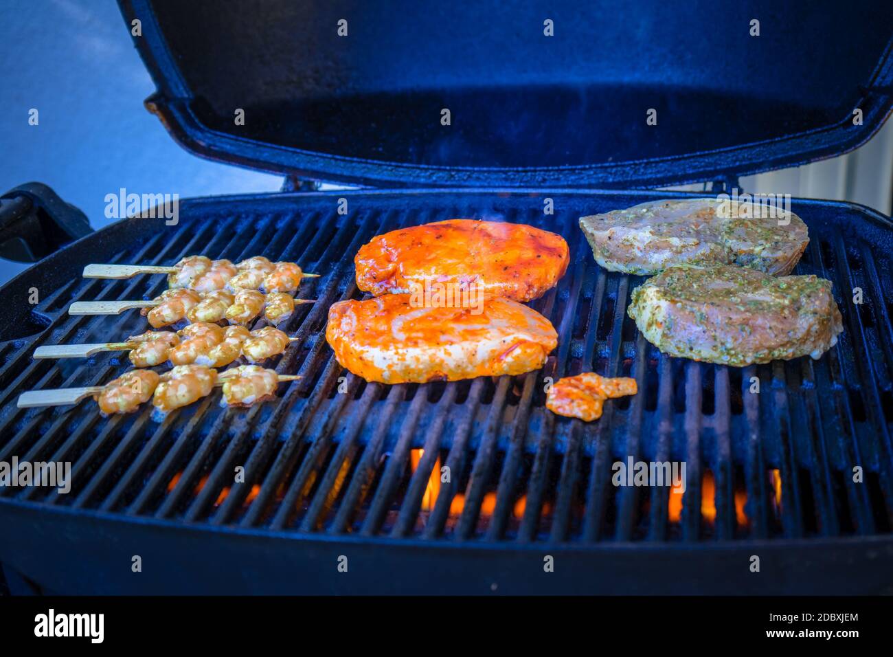 Steak and Fish on a Gas Grill Stock Photo - Alamy