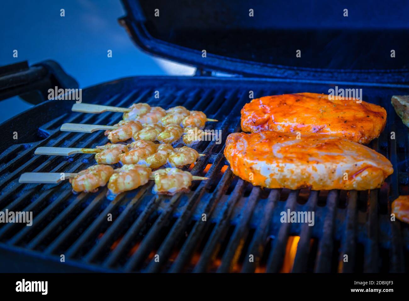 Steak and Fish on a Gas Grill Stock Photo - Alamy