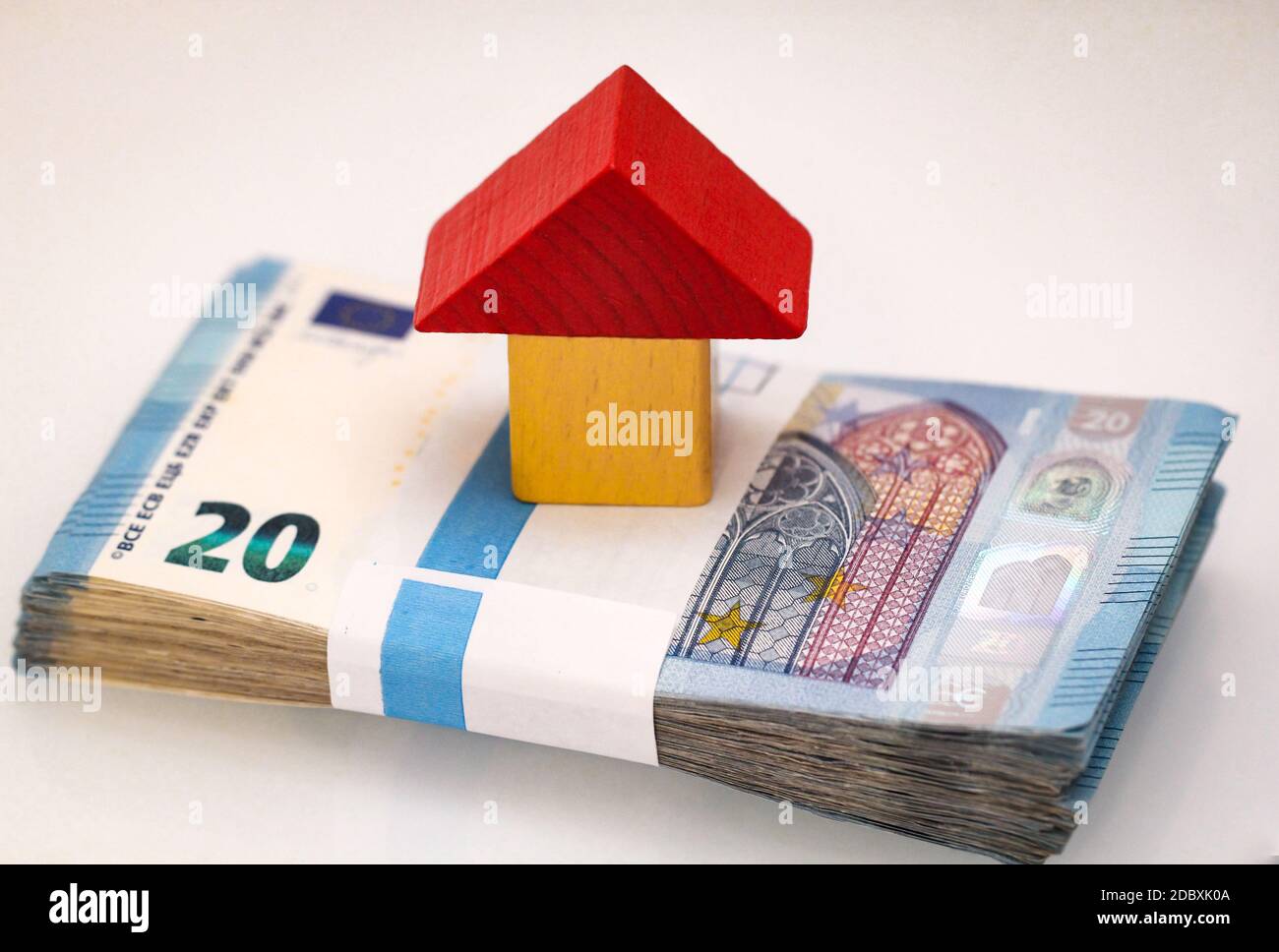 Banknotes, coins for investments for the future Stock Photo - Alamy