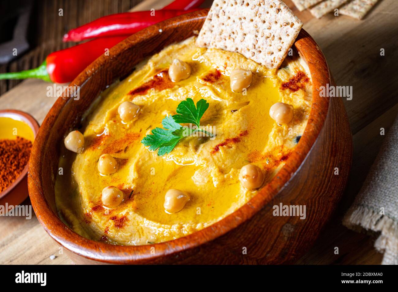 Delicious hummus paste with lemon and chilli Stock Photo - Alamy