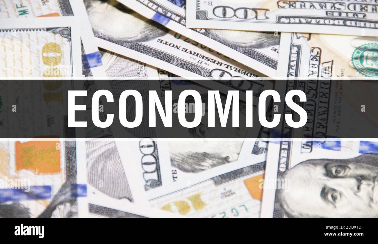 Economics text Concept Closeup. American Dollars Cash Money,3D ...
