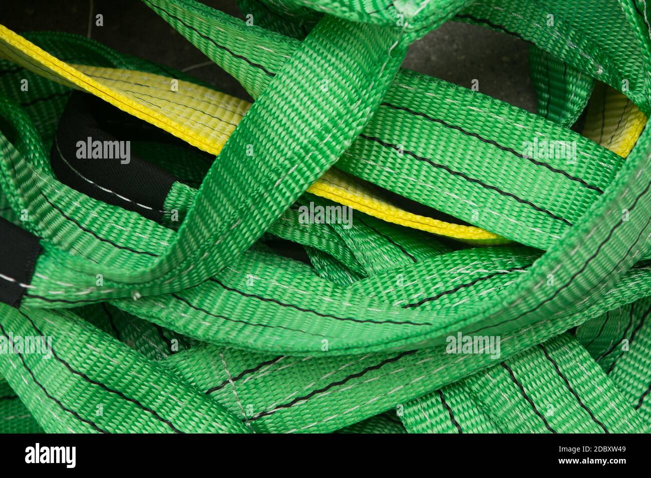 Industrial sewing machine sews a webbing sling. Manufacture of textile ...