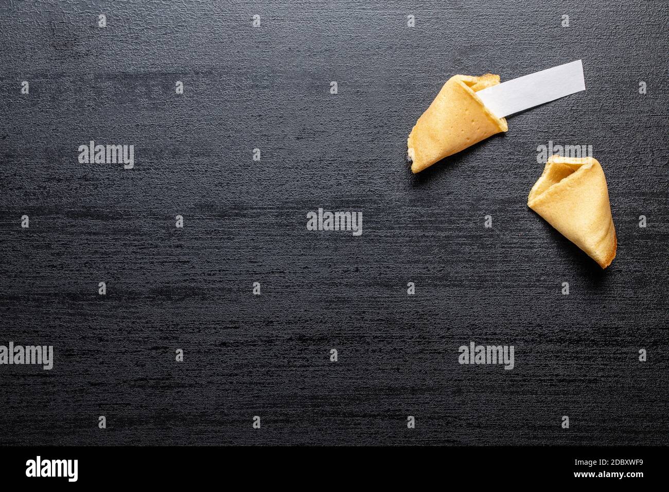 Chinese lucky cookies. Fortune cookies on black table. Top view Stock ...