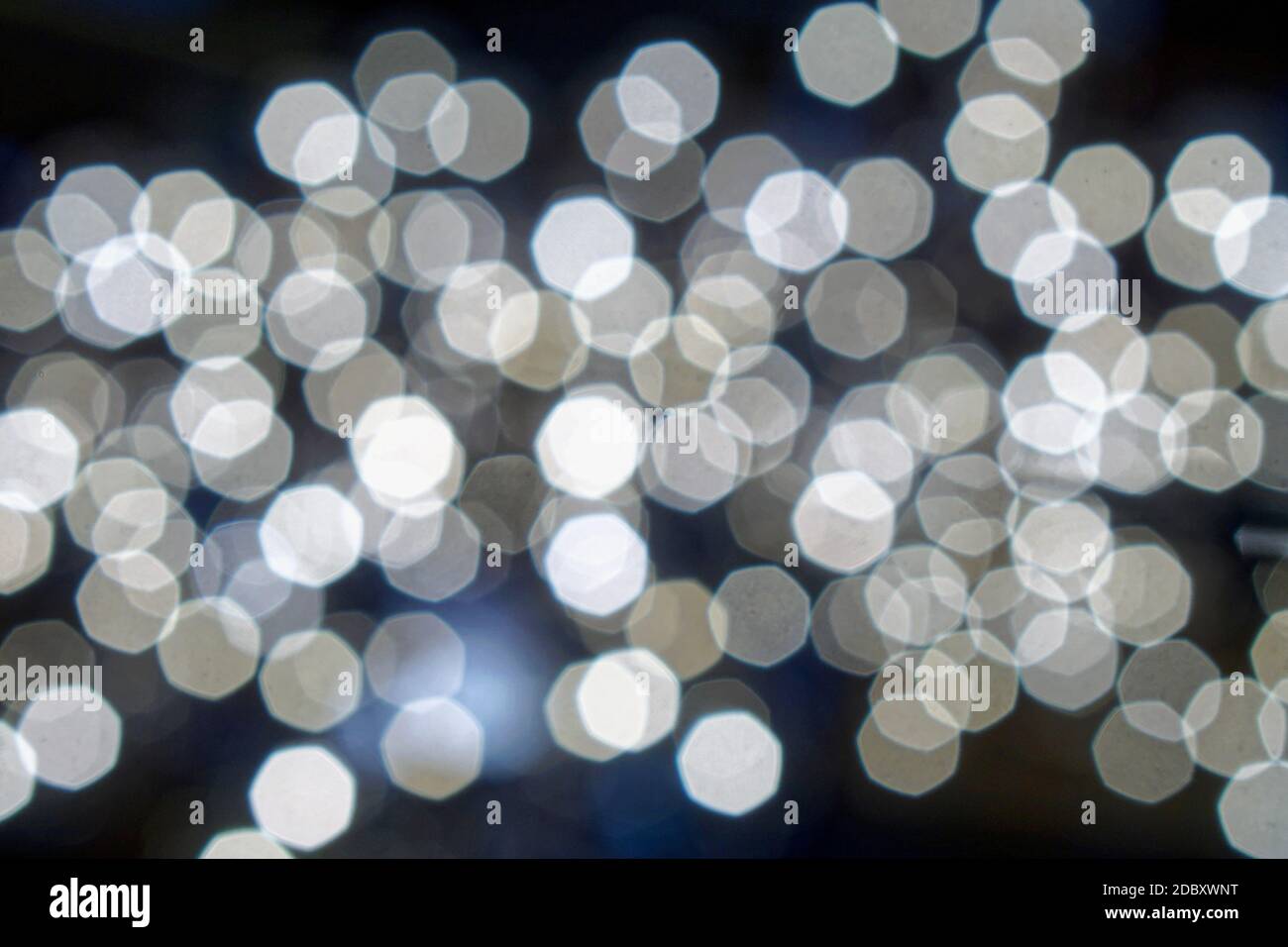 Abstract blurry white lights background Stock Photo - Alamy