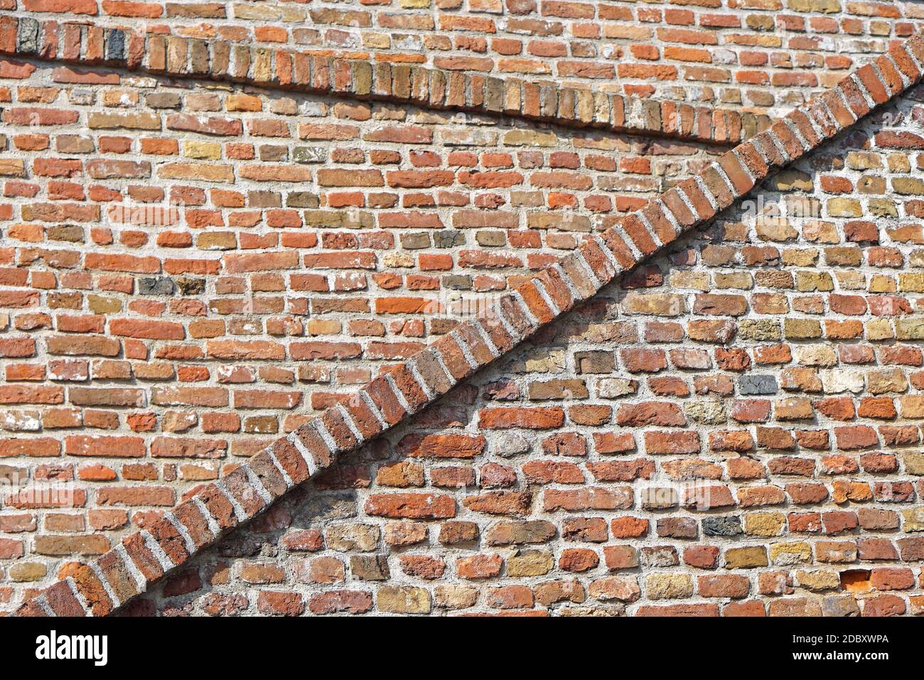 Old red brickwork walls with diagonal lines Stock Photo - Alamy