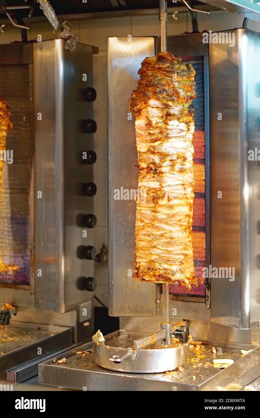Gyros grill meat at Greek fast food restaurant Stock Photo - Alamy