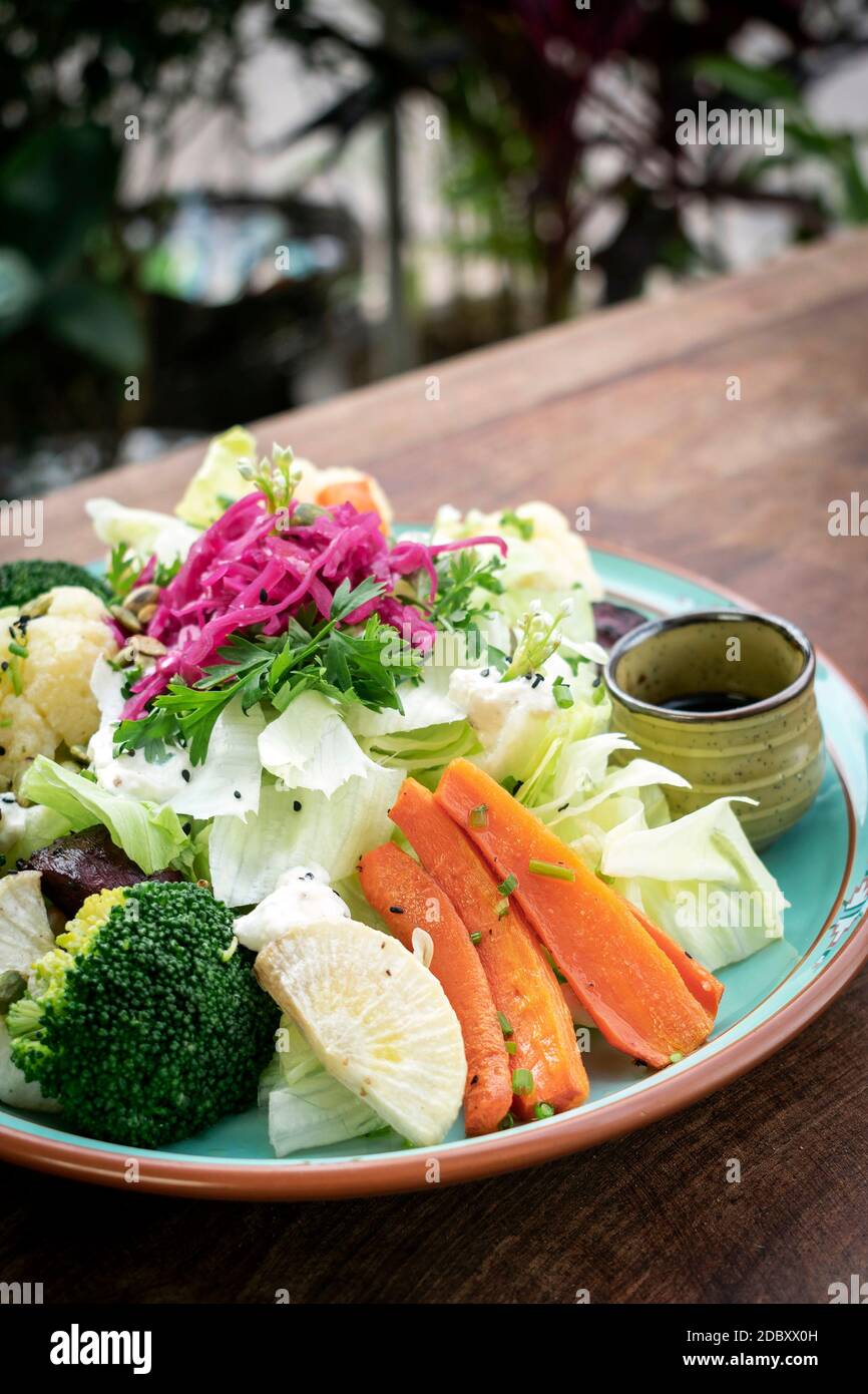 rustic cottage salad with healthy mixed steamed and fresh vegetables on ...