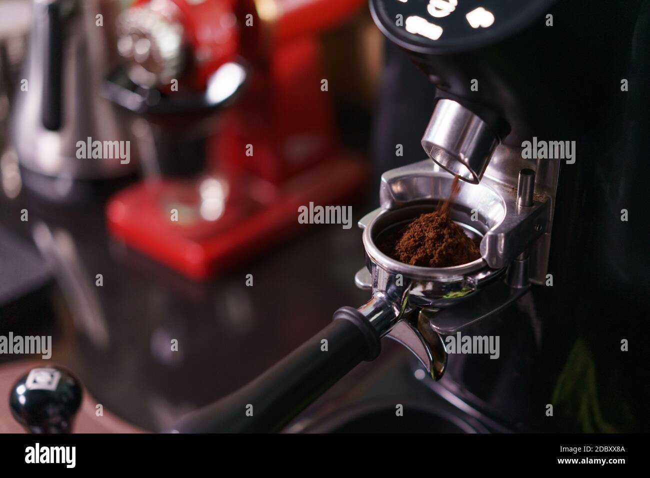 coffee powder from grinder on portafilter Stock Photo - Alamy