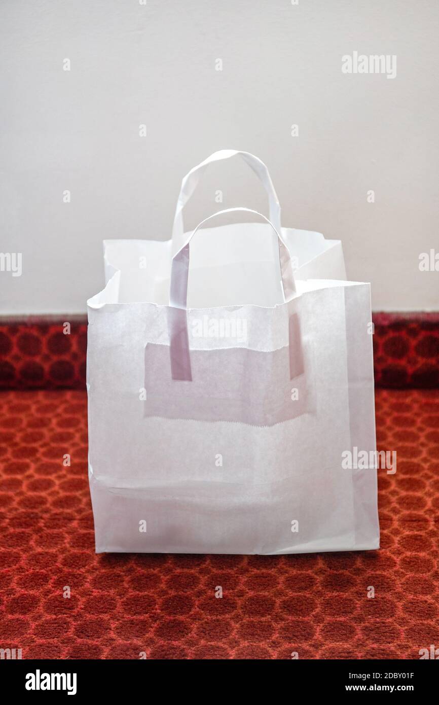Big White Paper Shopping Bag at Floor Stock Photo - Alamy Big White Paper Shopping Bag at Floor Stock Photo - Alamy