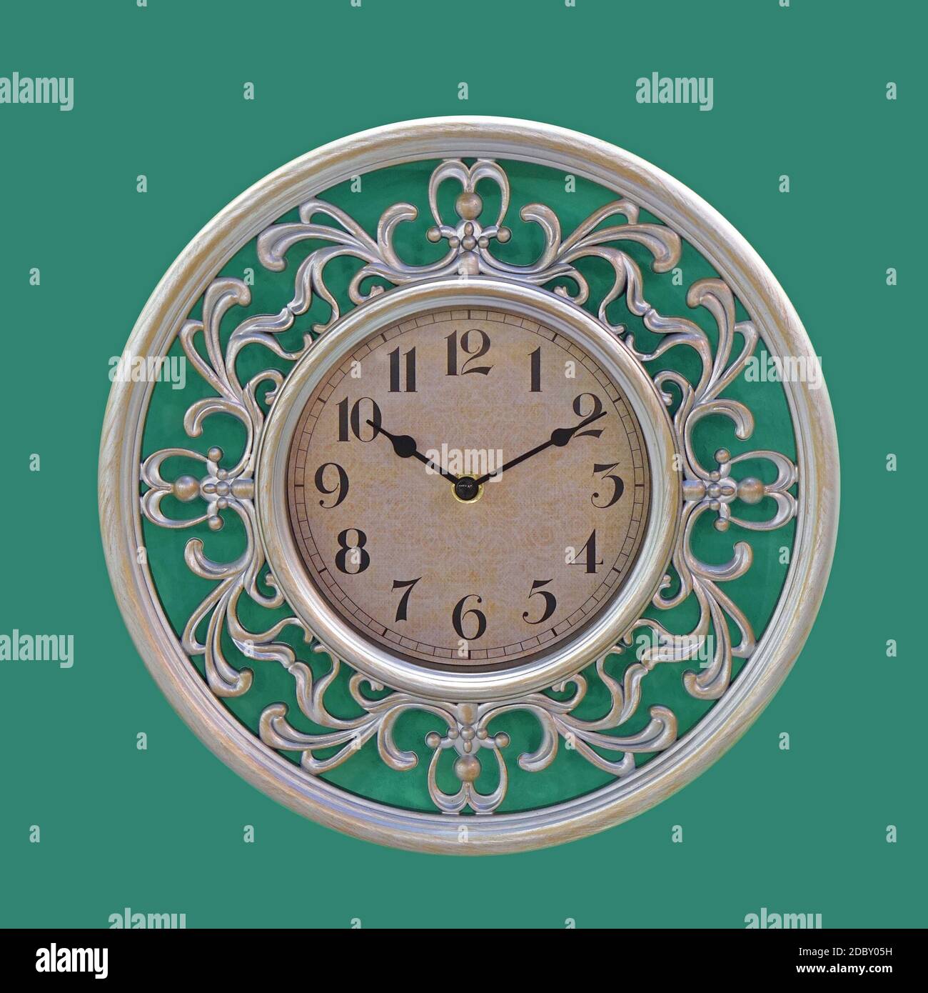 Big vintage round clock at green wall Stock Photo - Alamy