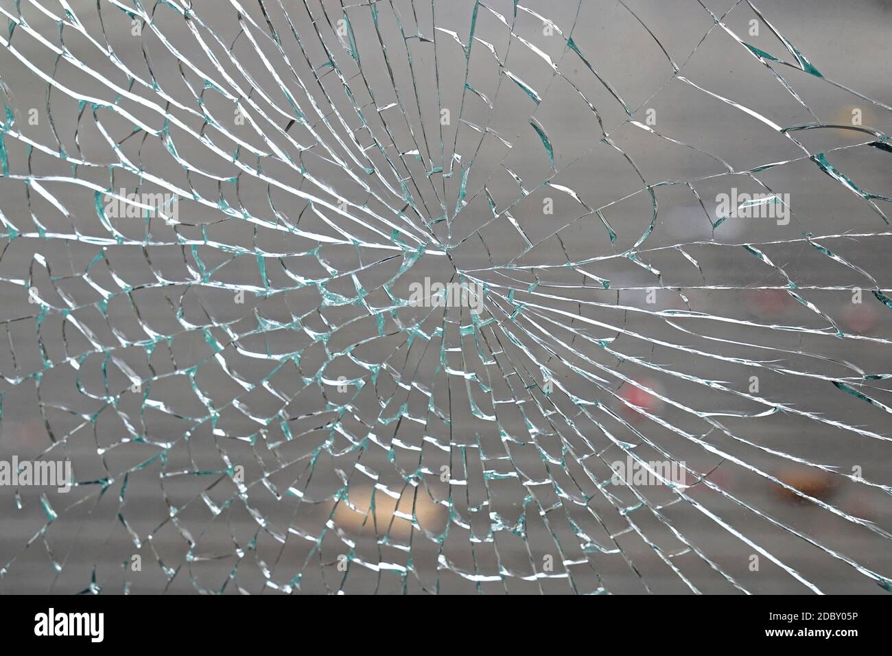Broken window and cracked glass damage Stock Photo - Alamy
