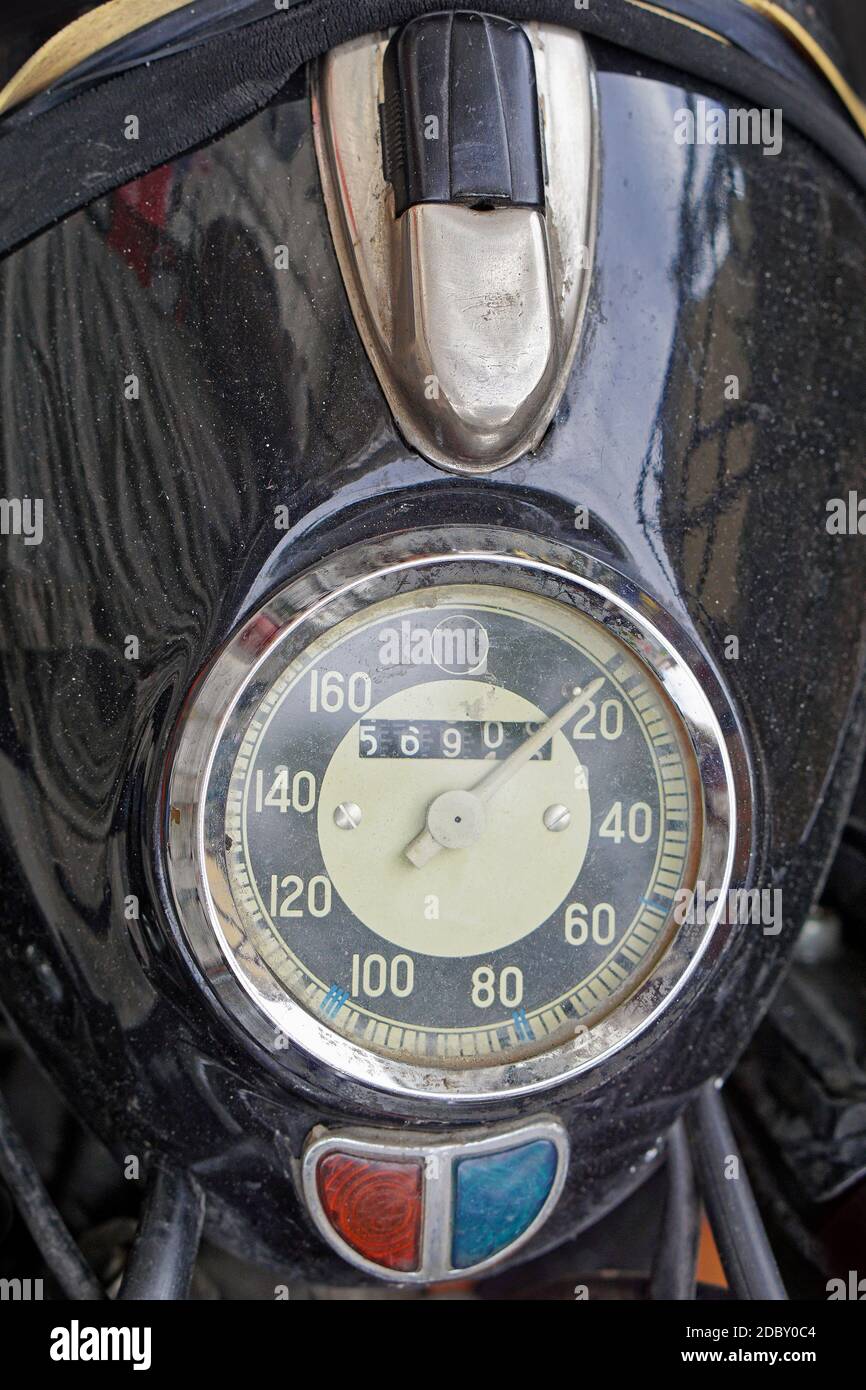 Classic vintage motorcycle speedometer at top of headlight Stock Photo ...