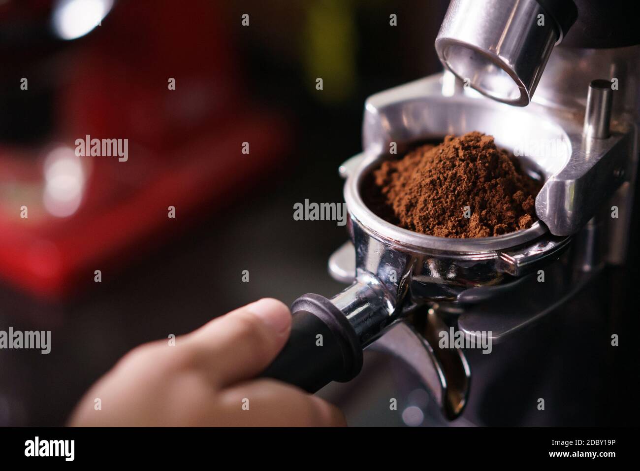 coffee powder from grinder on portafilter Stock Photo - Alamy