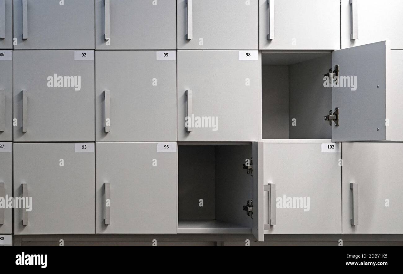 Small lockers storage compartments with numbers Stock Photo - Alamy