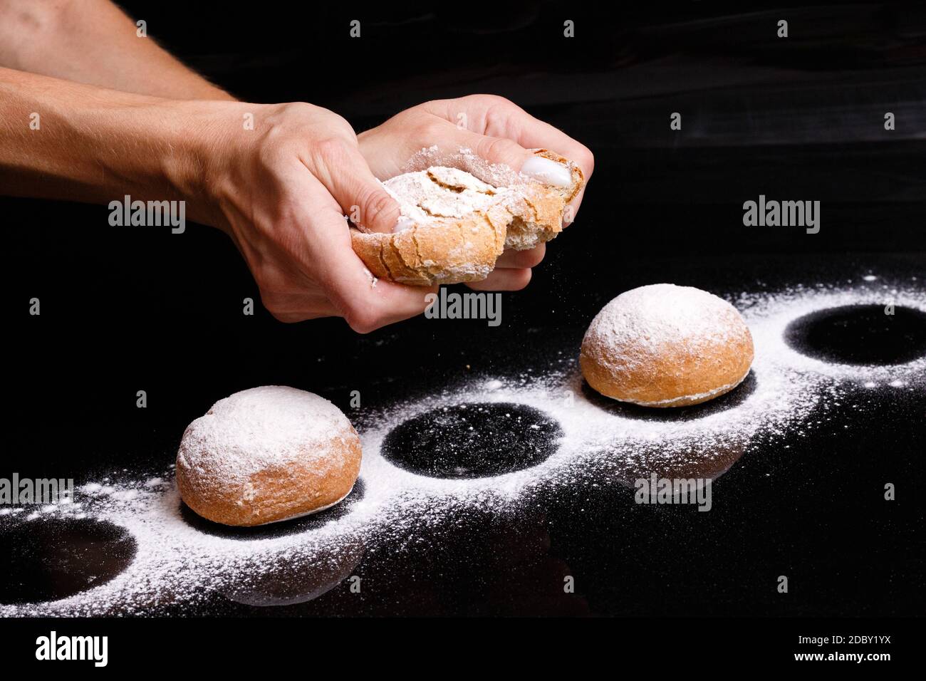 Homemade pastries. White buns are separated by hand. Photo of baking on ...