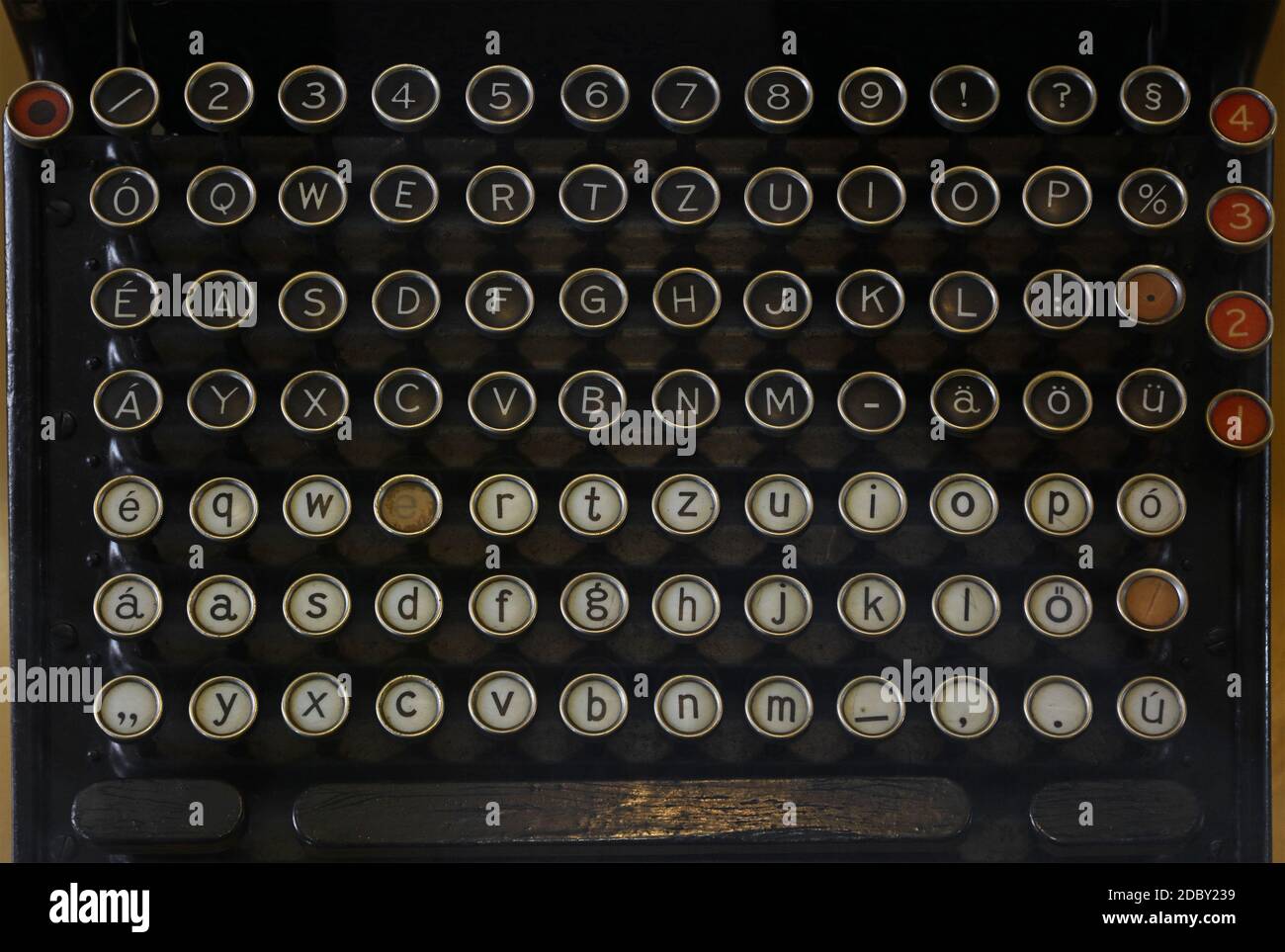 Latinic keyboard of old vintage antique typewriter with round buttons ...