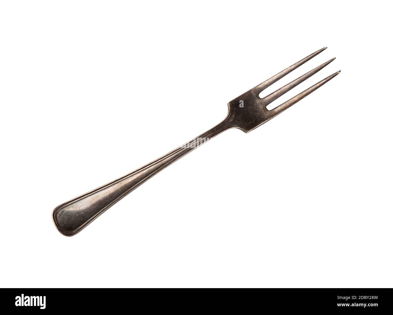 Close up one old vintage metal fork isolated on white background ...