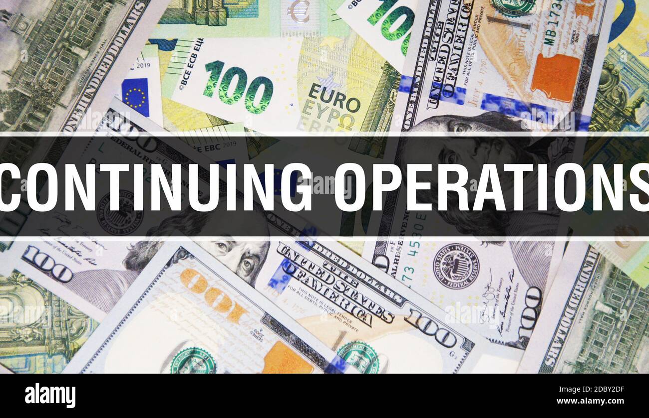 Continuing Operations text Concept Closeup. American Dollars Cash Money ...