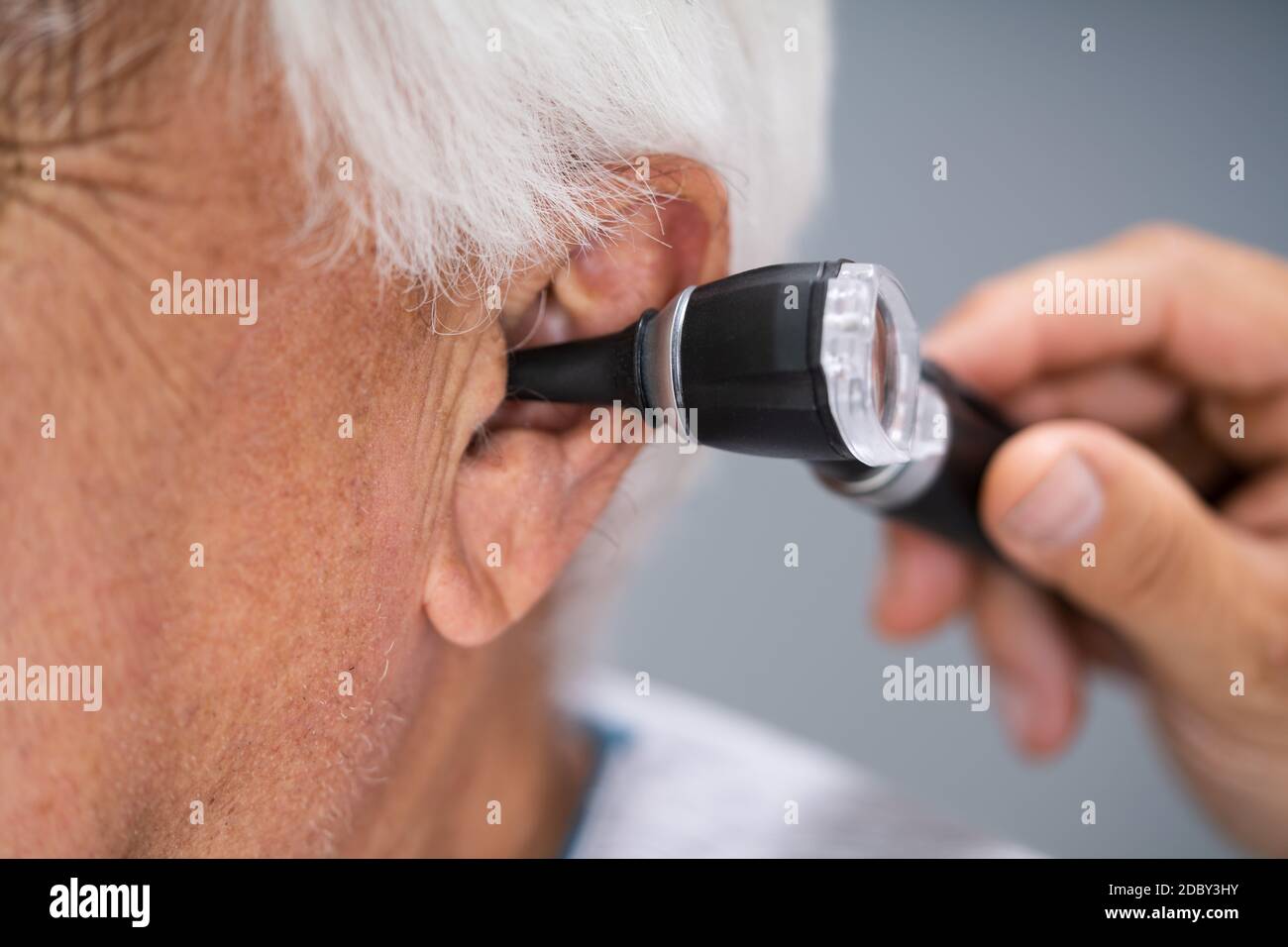 Doctor Checking Ear High Resolution Stock Photography and Images - Alamy